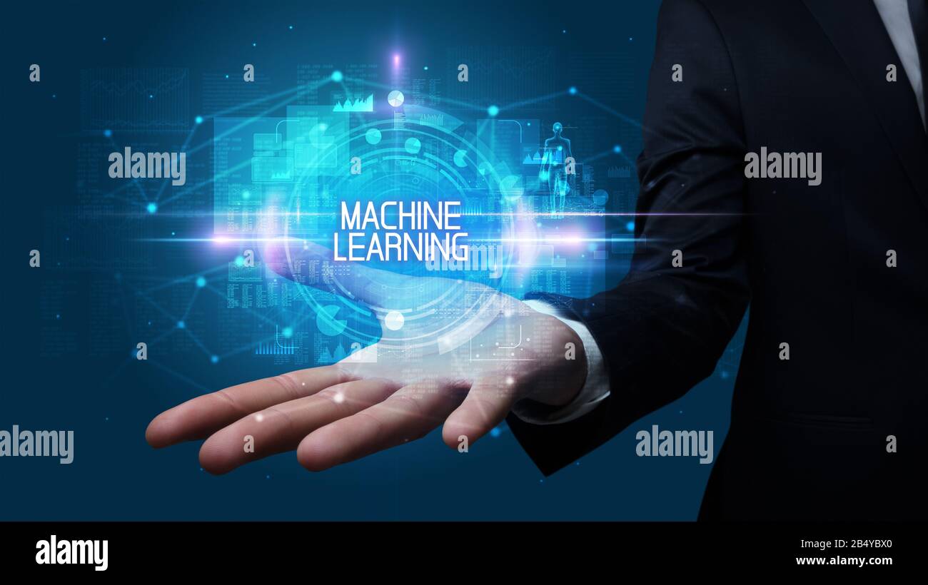Man hand holding MACHINE LEARNING inscription, technology concept Stock ...