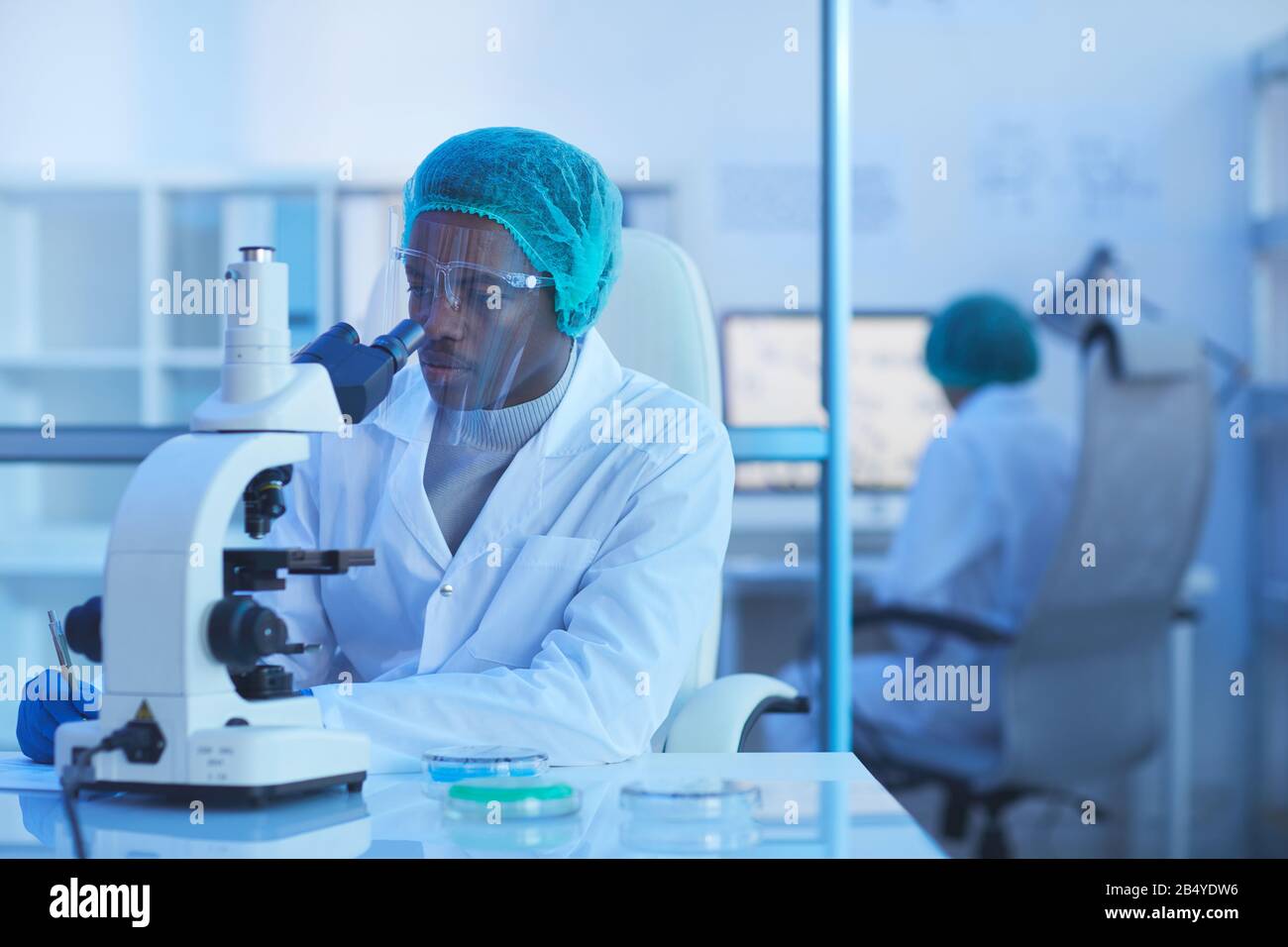 African american scientist working in hi-res stock photography and ...