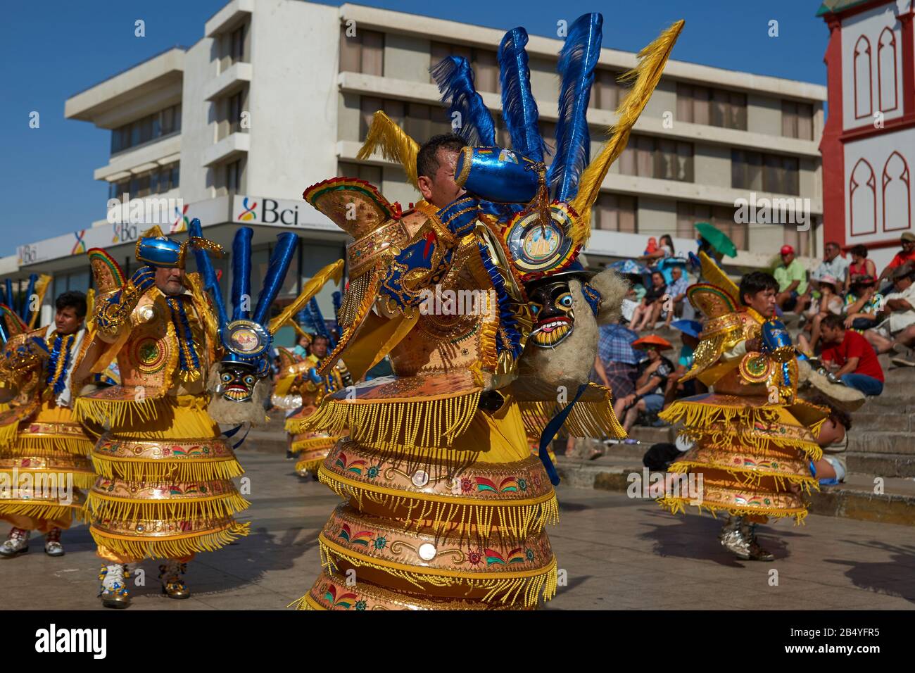 Morenada dancers performing during a street parade at the annual ...