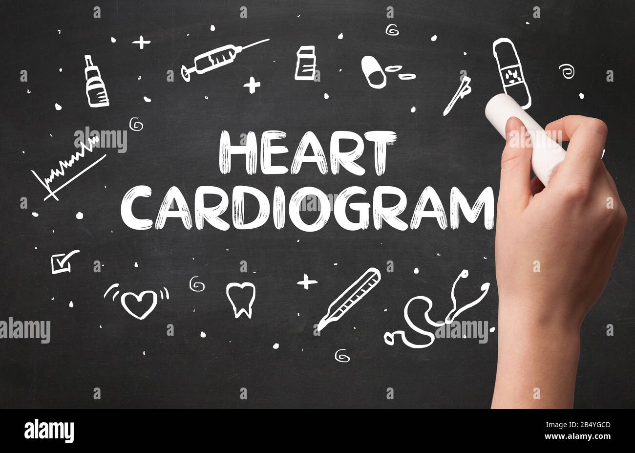 Hand drawing HEART CARDIOGRAM inscription with white chalk on ...