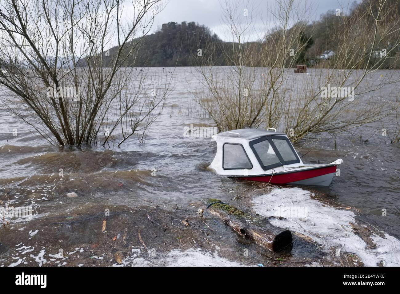 Boat capsized sunk in flooded lake due to deep sinking river water ...