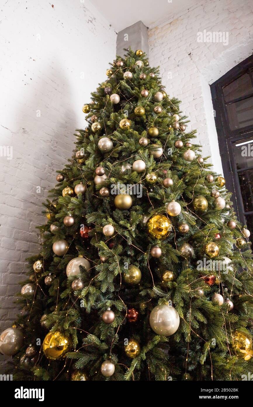 Low Angle View of a Giant Sparkling Christmas Tree Decorated with many ...