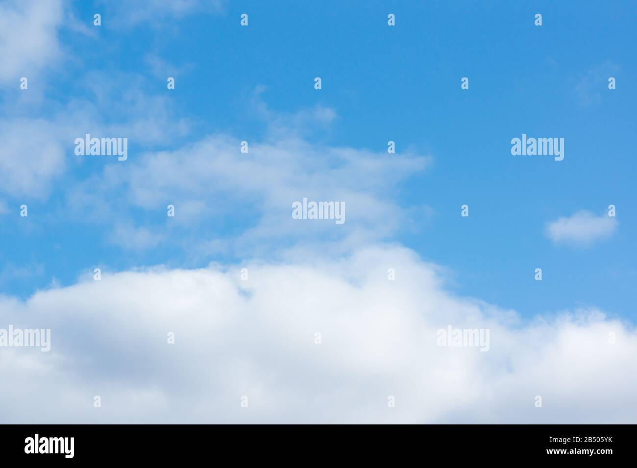 blue sky with flying white light clouds Stock Photo - Alamy