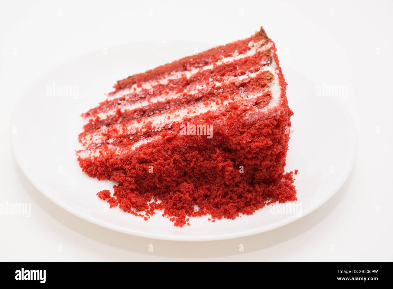 bright red cake called red velvet isolated on a white background Stock ...