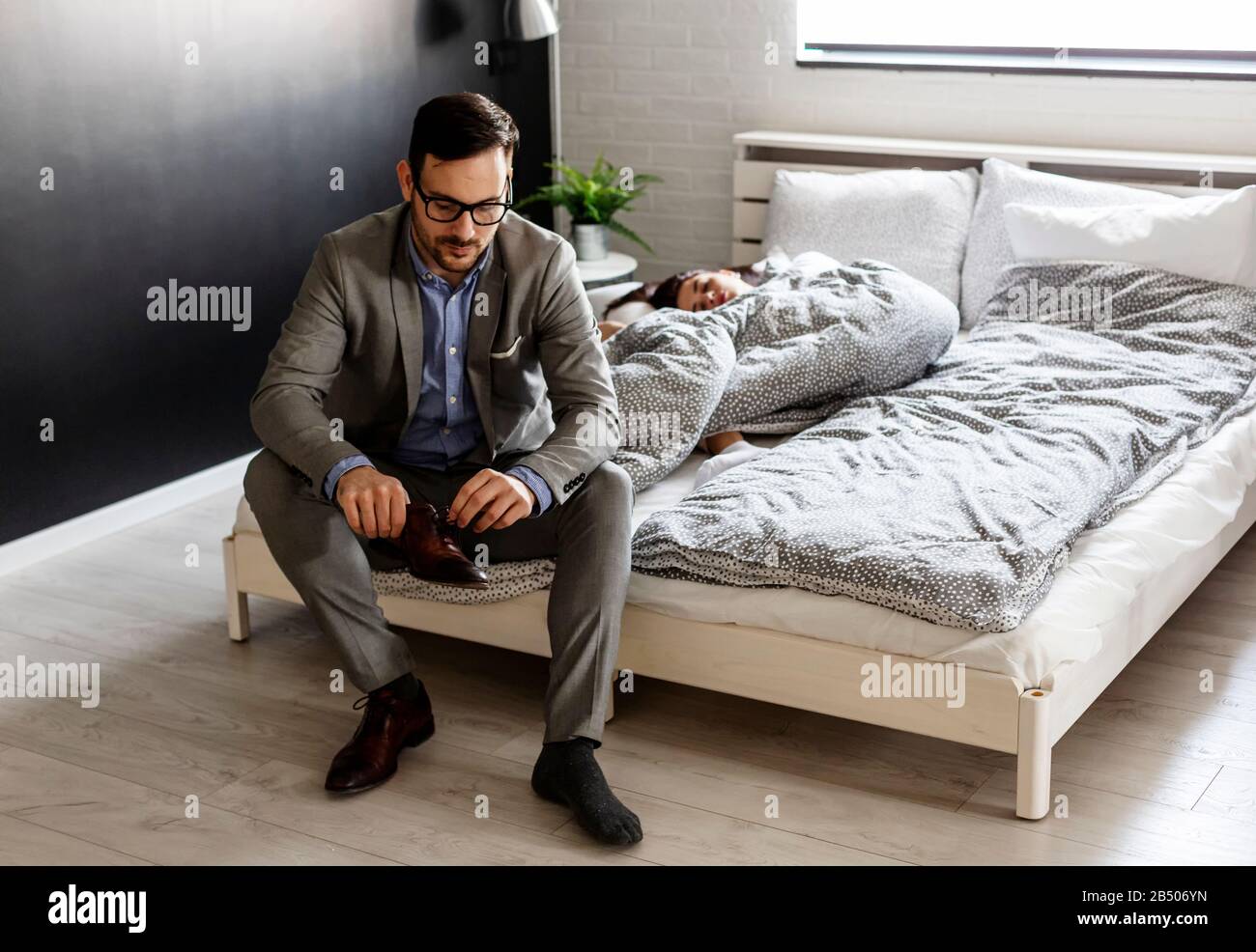 Couple early in the morning before going to work Stock Photo - Alamy