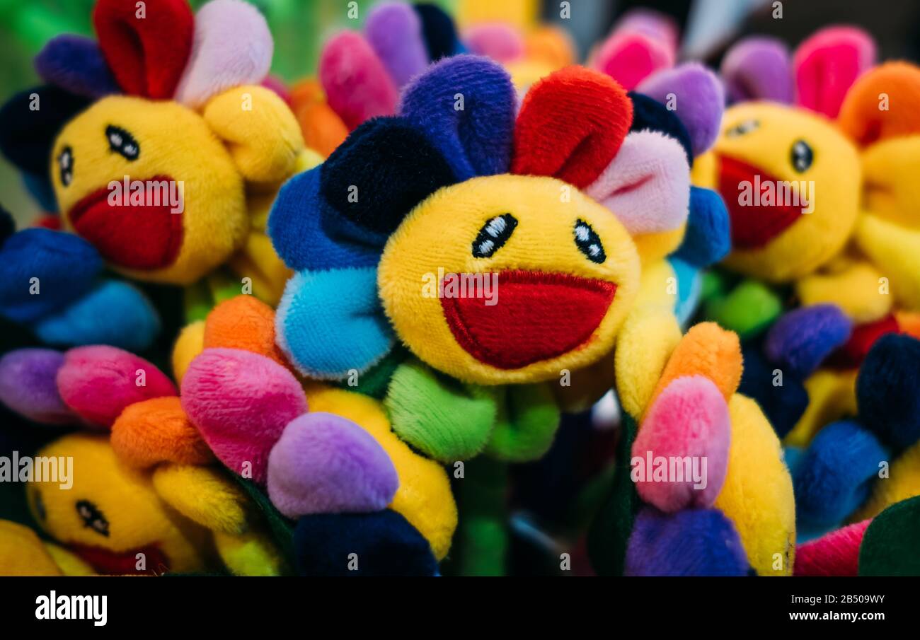 colorful Sunflower smiley face doll closeup view Stock Photo - Alamy
