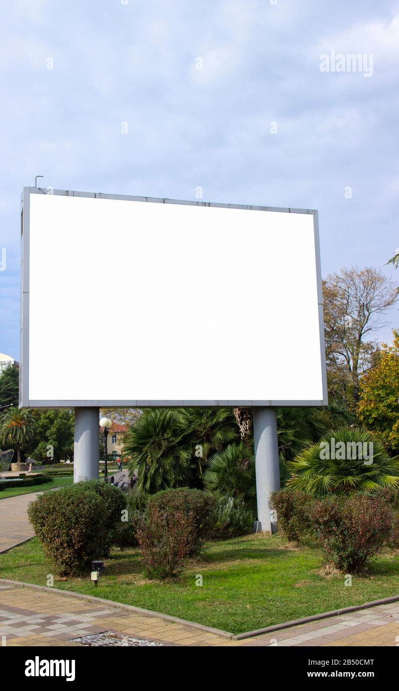 Electronic Billboard. Blank street billboard poster in the park on the ...