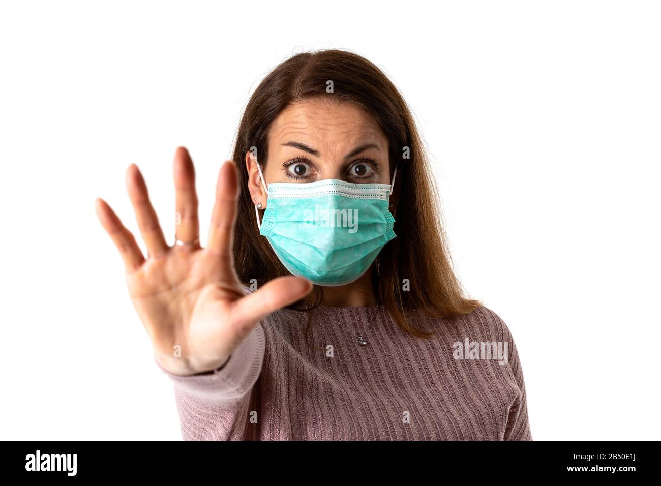 scared woman with a medical mask Stock Photo - Alamy