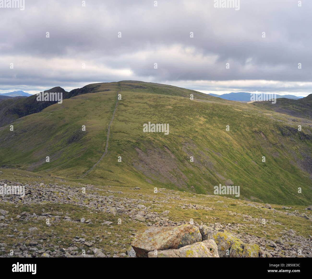 The dry stone wall on the slope of Scoat Fell Stock Photo - Alamy