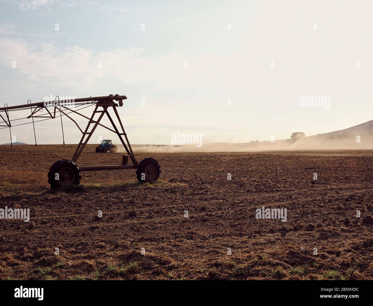 High resolution photo taken in the late afternoon of a tractor moving ...