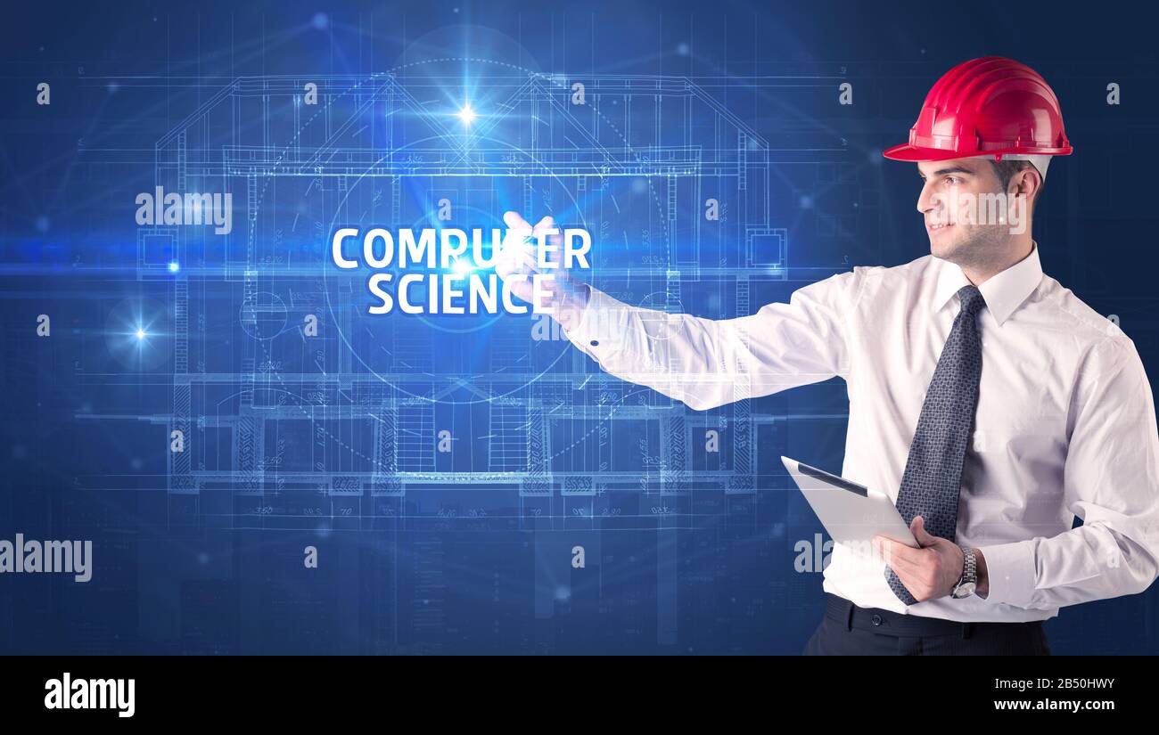 Handsome architect with helmet drawing COMPUTER SCIENCE inscription ...