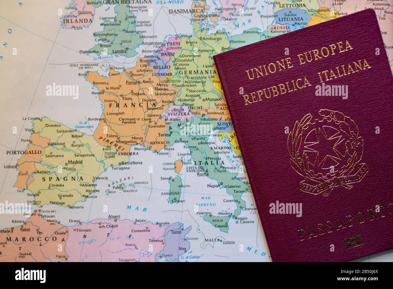 Italian passport with European political map. Close up view Stock Photo ...