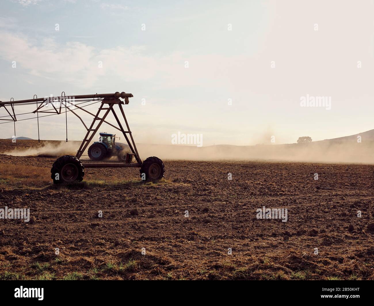 High resolution photo taken in the late afternoon of a tractor moving ...