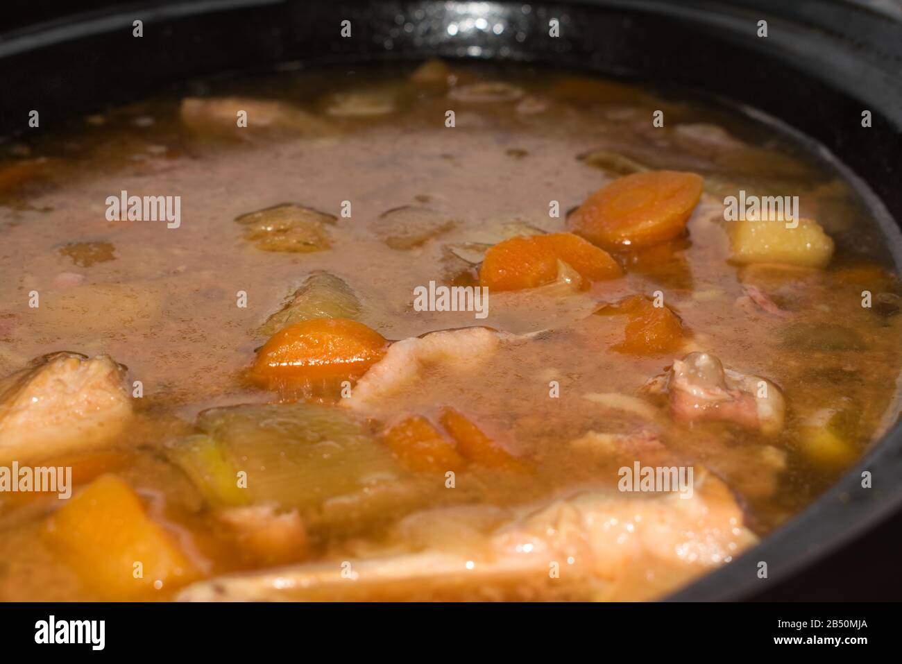 Chicken Stew with winter vegetables, close up Stock Photo - Alamy