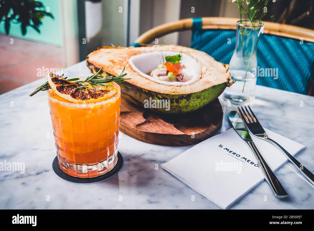 Hamachi and Coconut Ceviche Hamachi aguachile on a fresh, green coconut ...