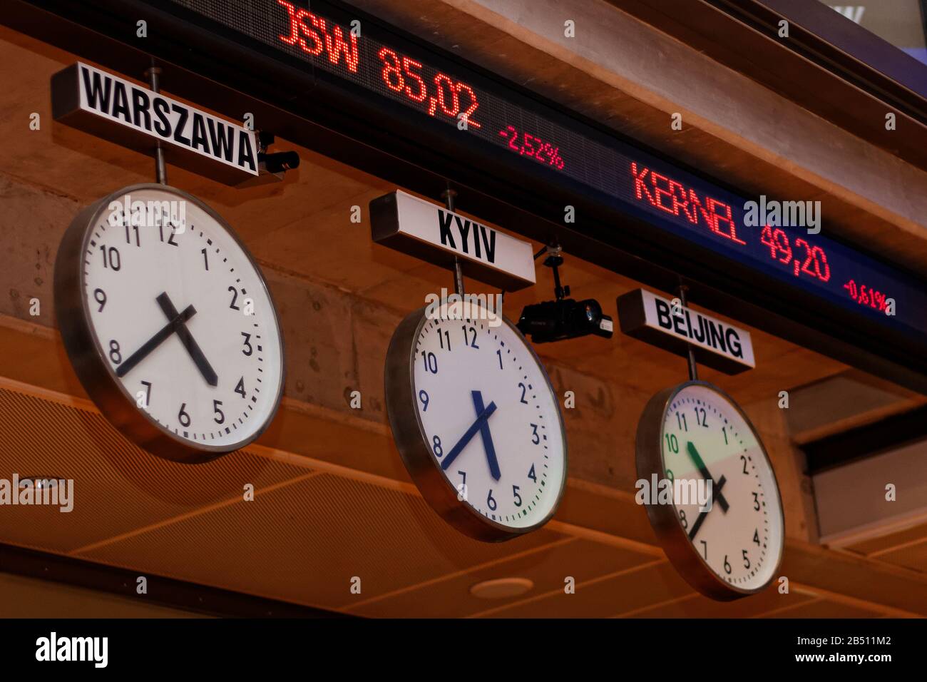 Three clock in trading room of Warsaw Stock Exchange (WSE, GPW Stock ...