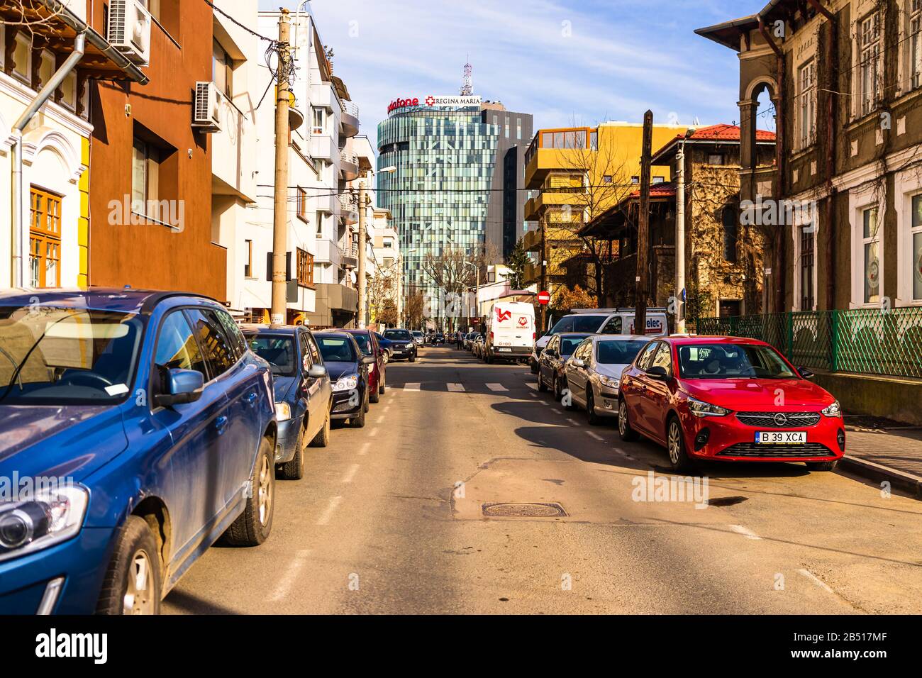 Car traffic in downtown area of Bucharest. Car pollution, traffic jam ...