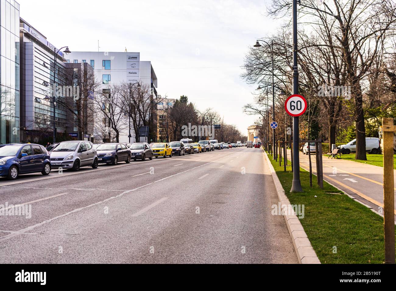 Car traffic in downtown area of Bucharest. Car pollution, traffic jam ...