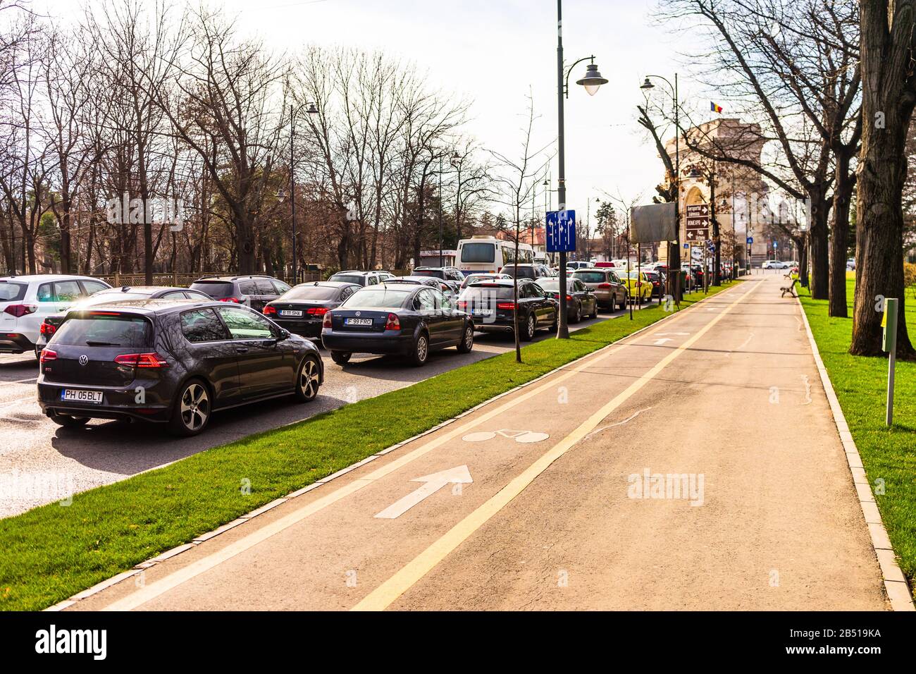 Car traffic in downtown area of Bucharest. Car pollution, traffic jam ...