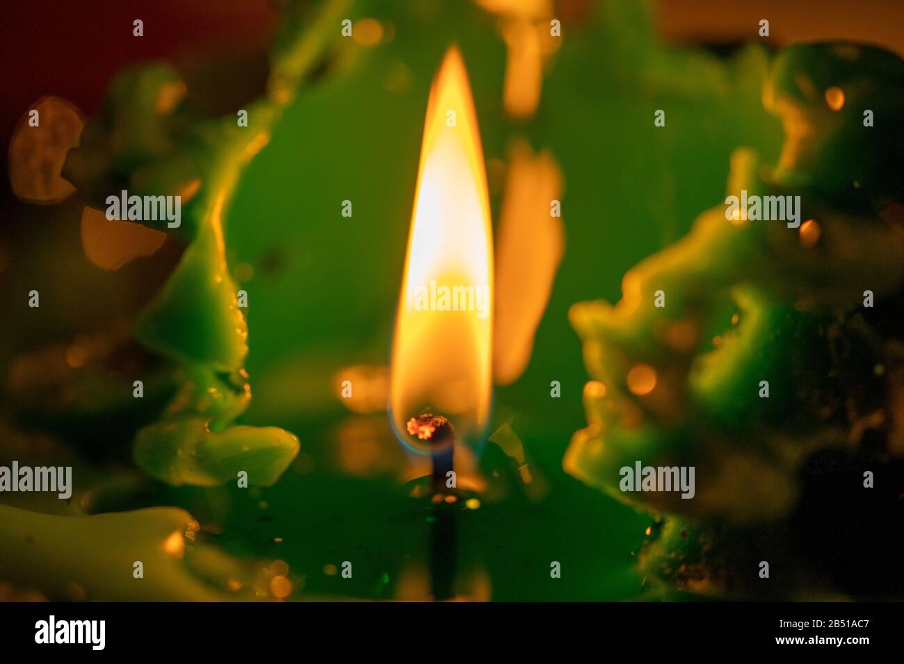 Single candle burning green hi-res stock photography and images - Alamy