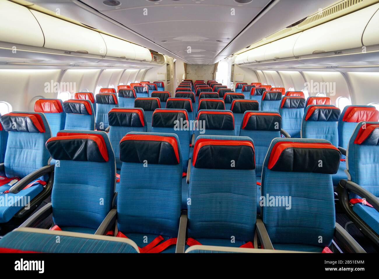 Aircraft interior. The passenger cabin of modern passenger airplane ...