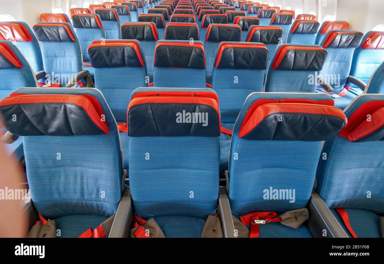 Aircraft interior. The passenger cabin of modern passenger airplane ...