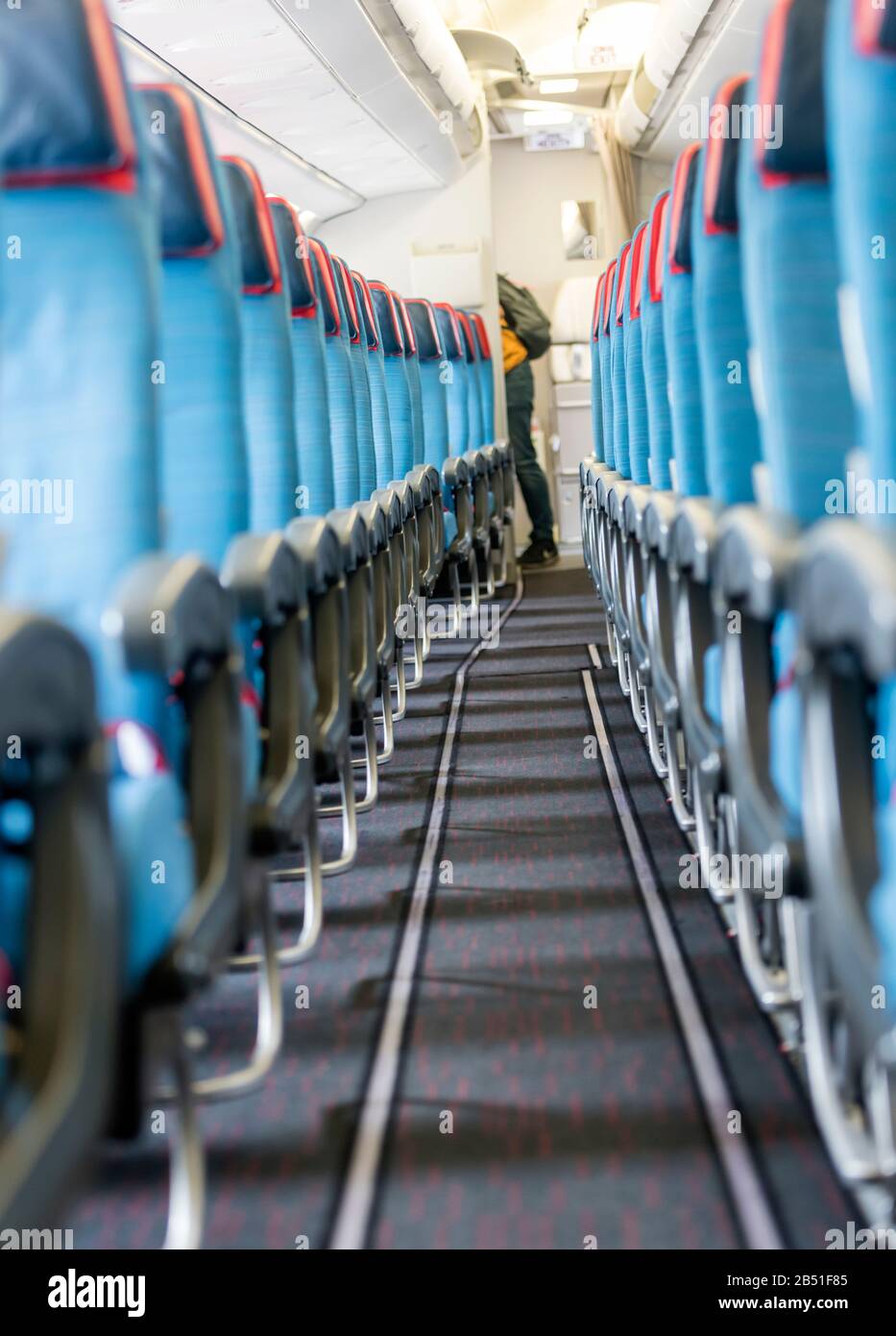 Aircraft interior. The passenger cabin of modern passenger airplane ...