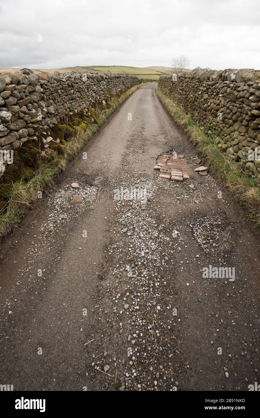 DIY road maintenance Stock Photo - Alamy