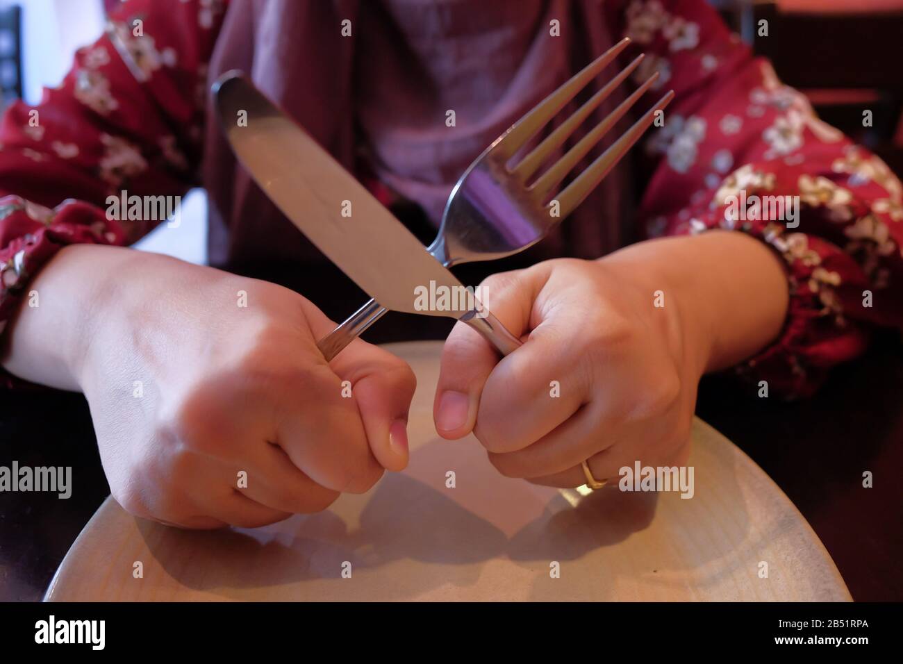 Female knife and fork hi-res stock photography and images - Alamy