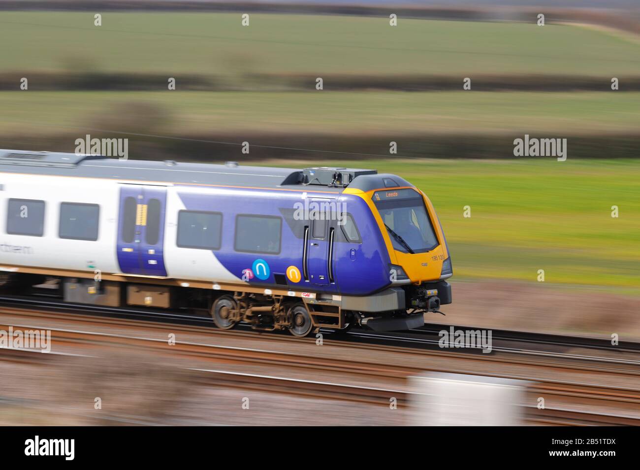 A rail class 195 by Northern by Arriva at Colton Junction near York ...