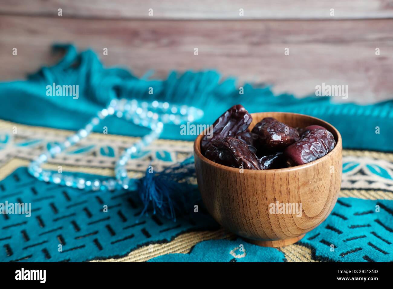 top view of date fruits drops in a bowl Stock Photo - Alamy