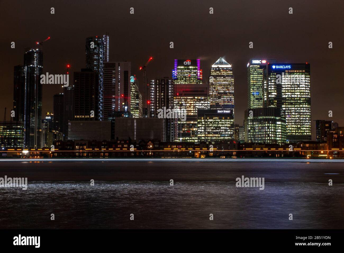 The highrise buildings of Canary Wharf and the Docklands at night from ...
