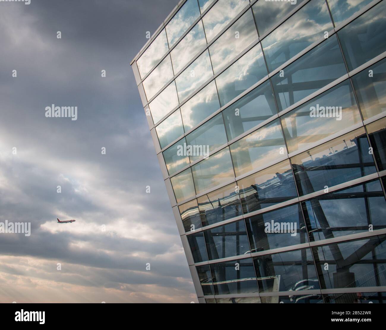 Exterior of terminal with glass windows at JFK International airport ...