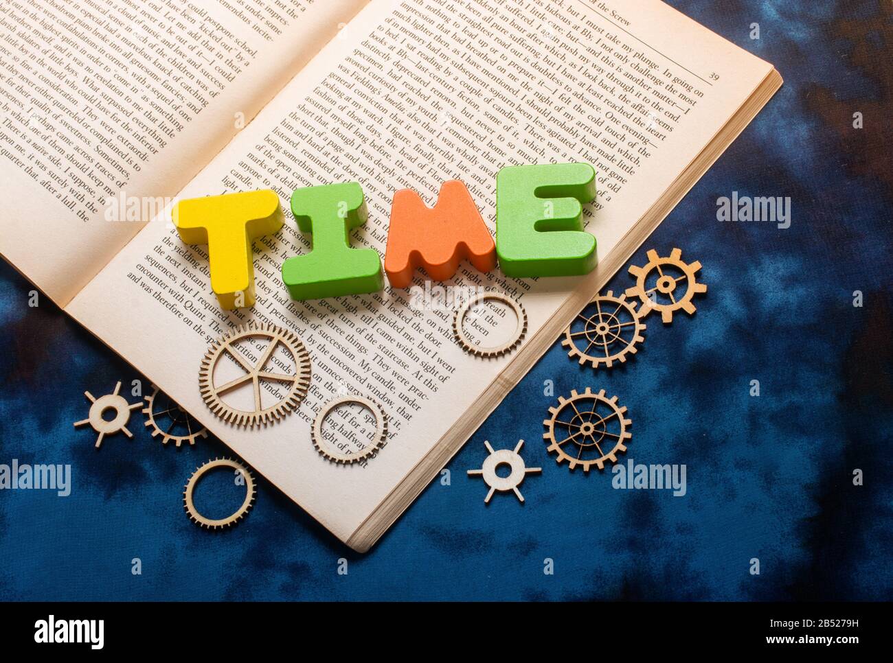 Colorful time wording with gears as time concept Stock Photo - Alamy