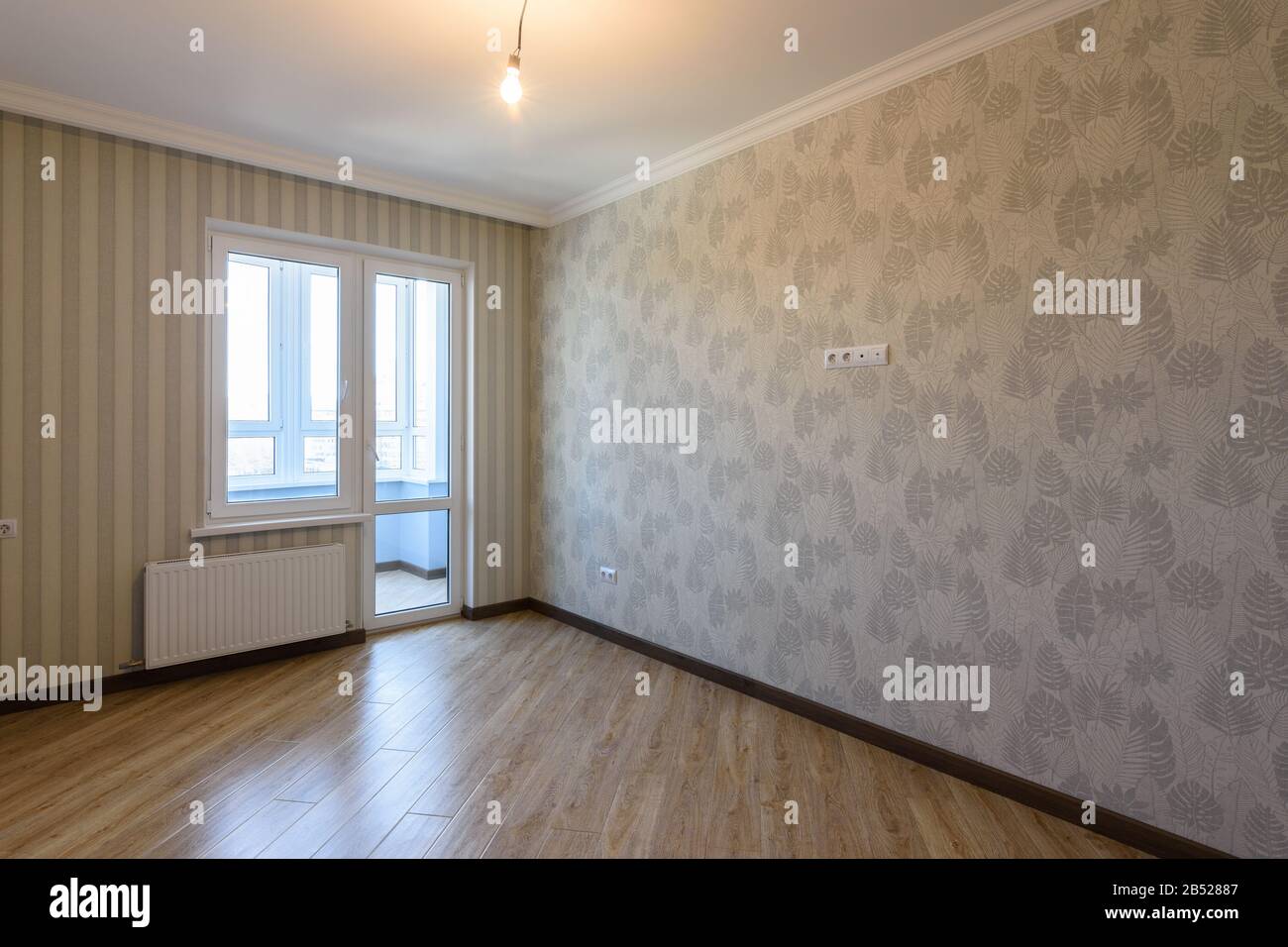 The interior of a freshly renovated kitchen without furniture in a new ...