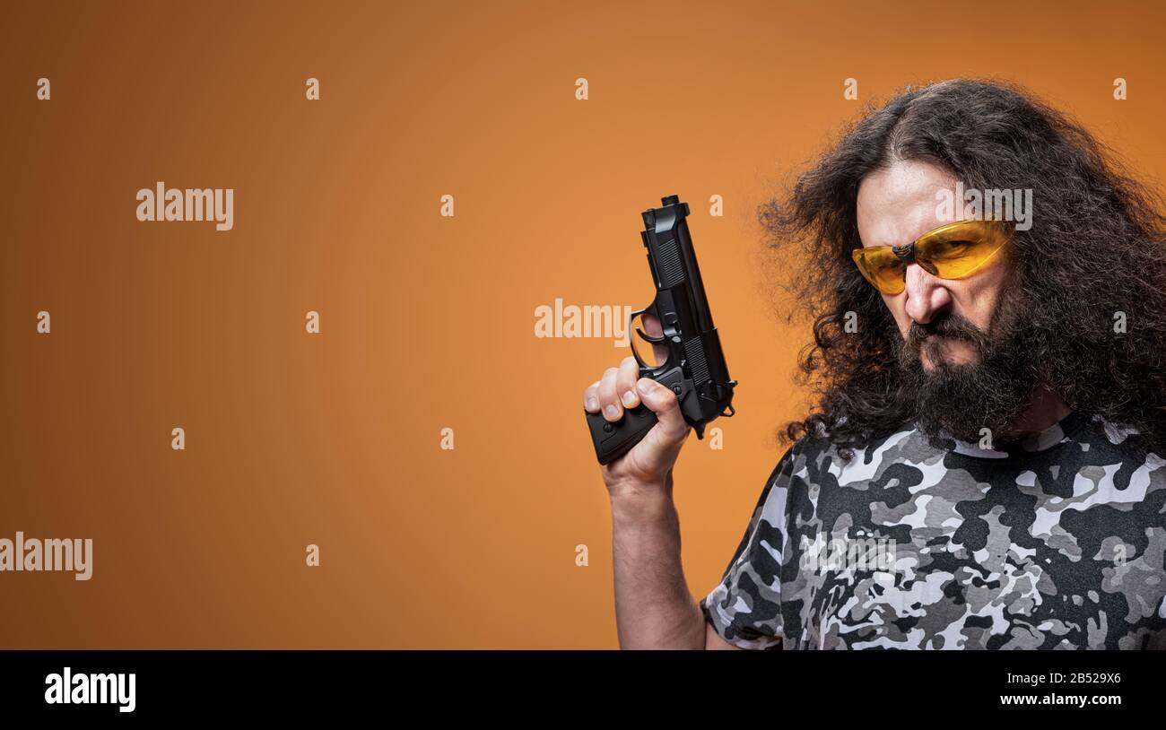 Soldier holding gun rifle hi-res stock photography and images - Alamy