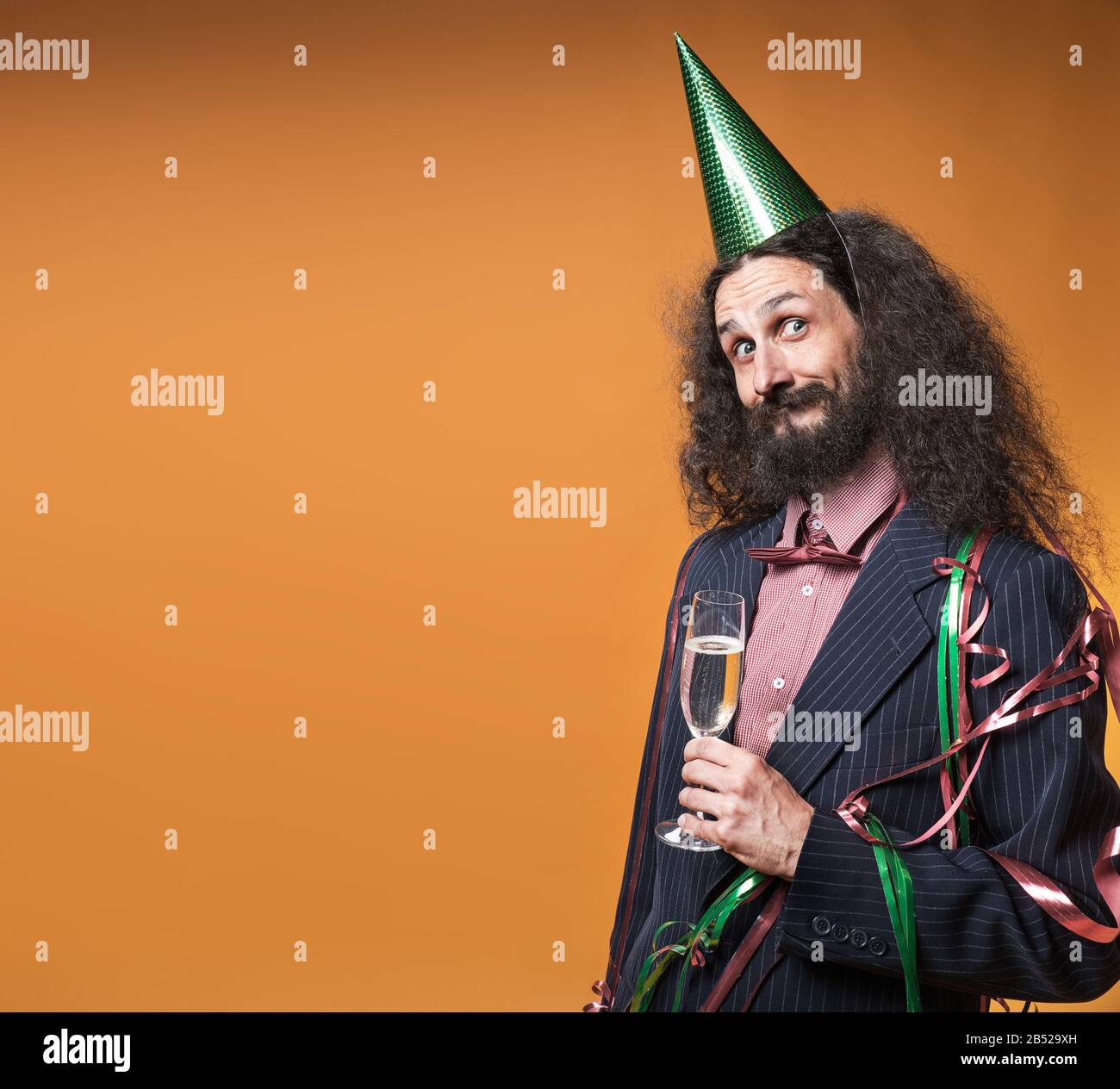 Portrait of an enthusiastic guy celebrating a success Stock Photo - Alamy