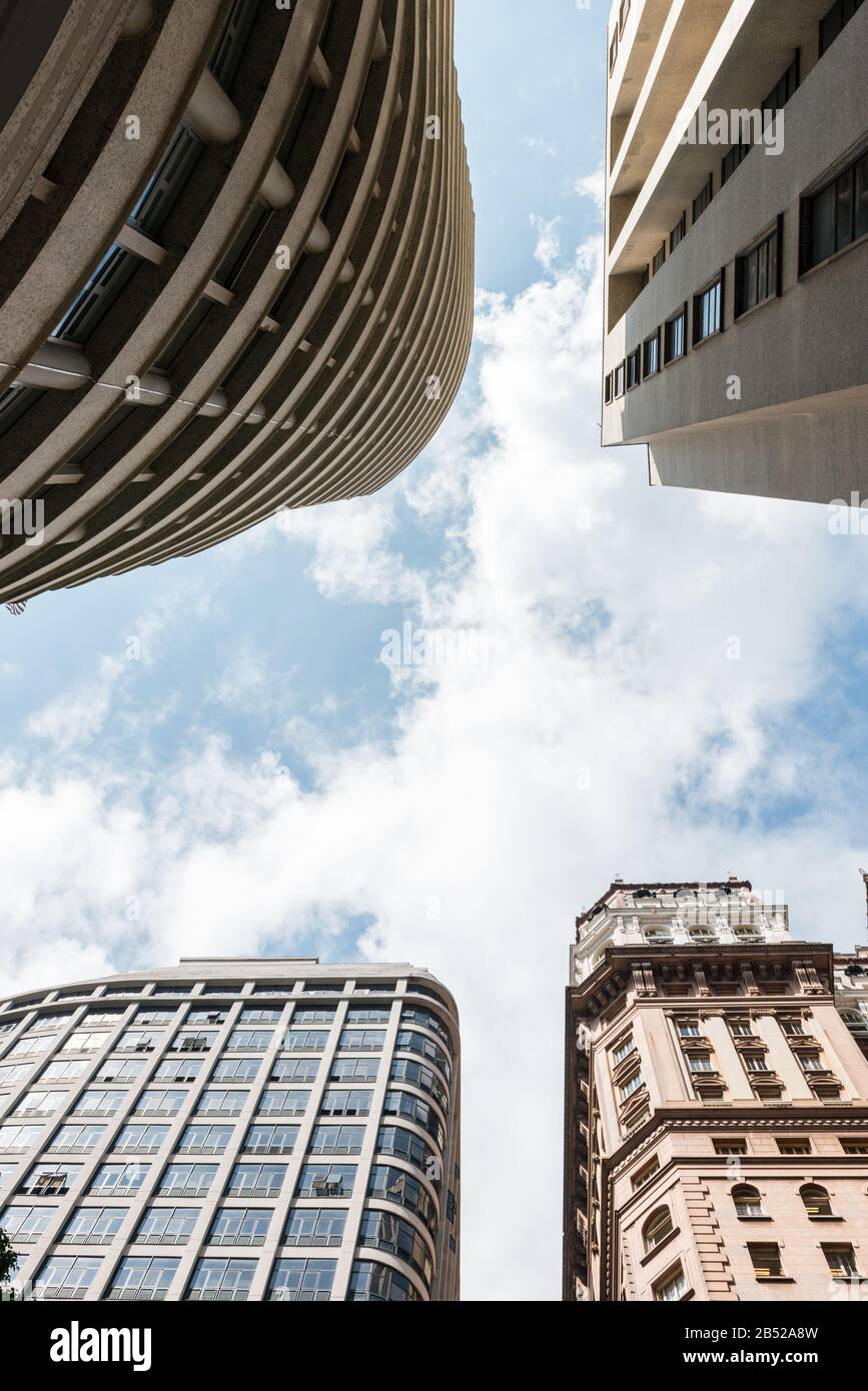 Upwards view of different architecture buildings located in the heart ...