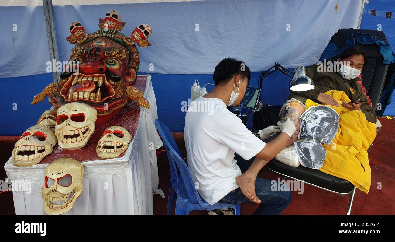 Lalitpur, Nepal. 07th Mar, 2020. A tattoo enthusiast attends the ...