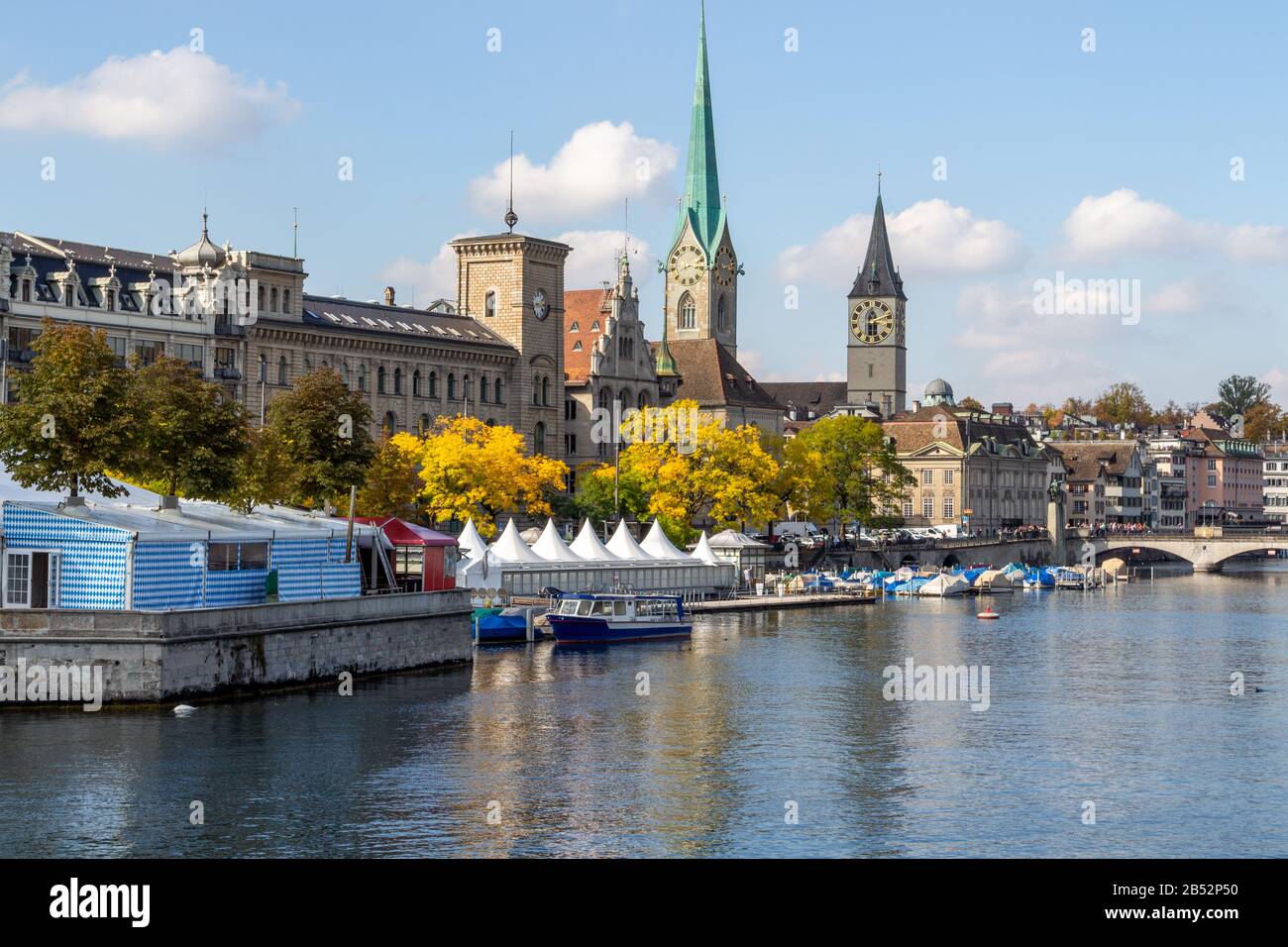 view at the waterfront of Limmat river in Zurich, Switzerland with ...