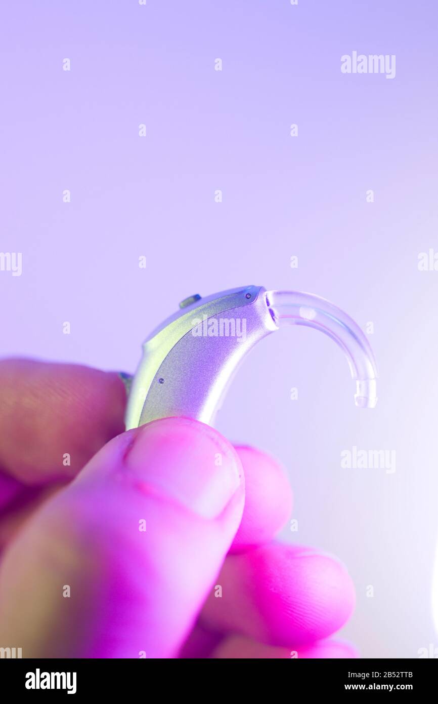 Modern digital hearing aid for deafness and deaf people Stock Photo - Alamy