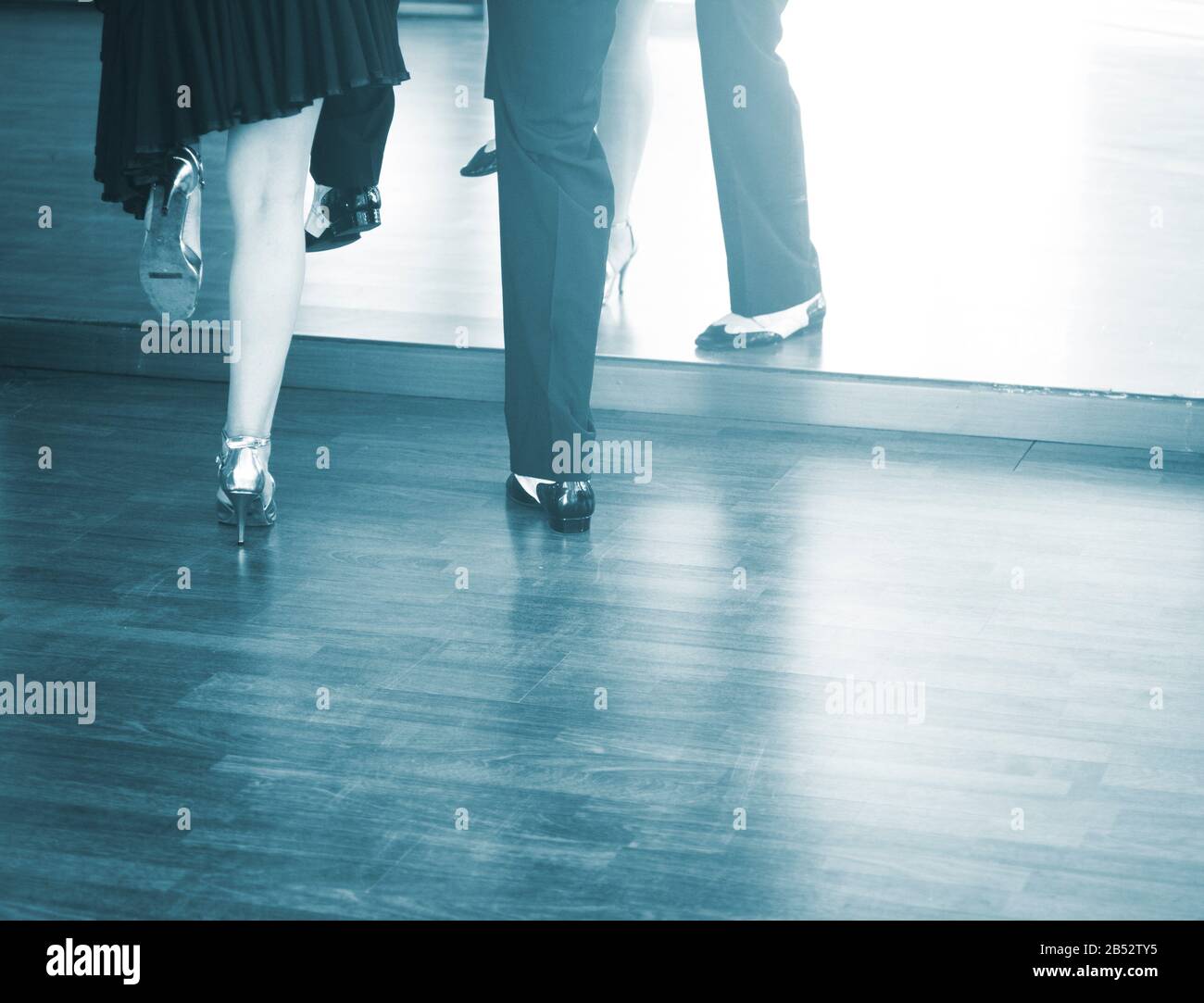 Ballroom dance couple of dancers and teachers in studio school dancing ...