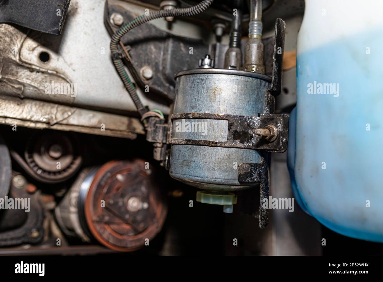 New fuel filter mounted and screwed on the car in the wheel arch Stock ...