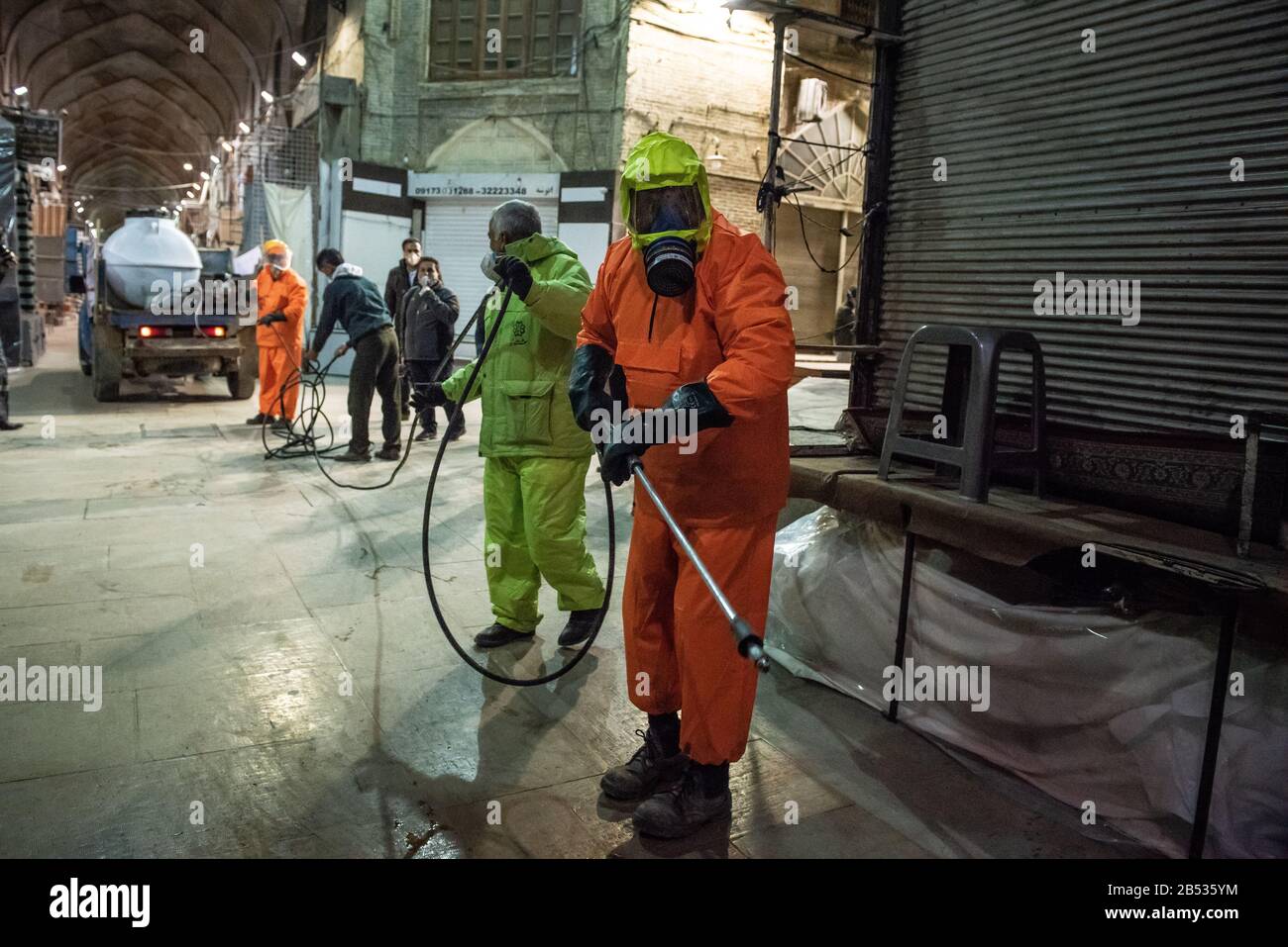 Iranian health ministry staff, the provincial fire department and ...