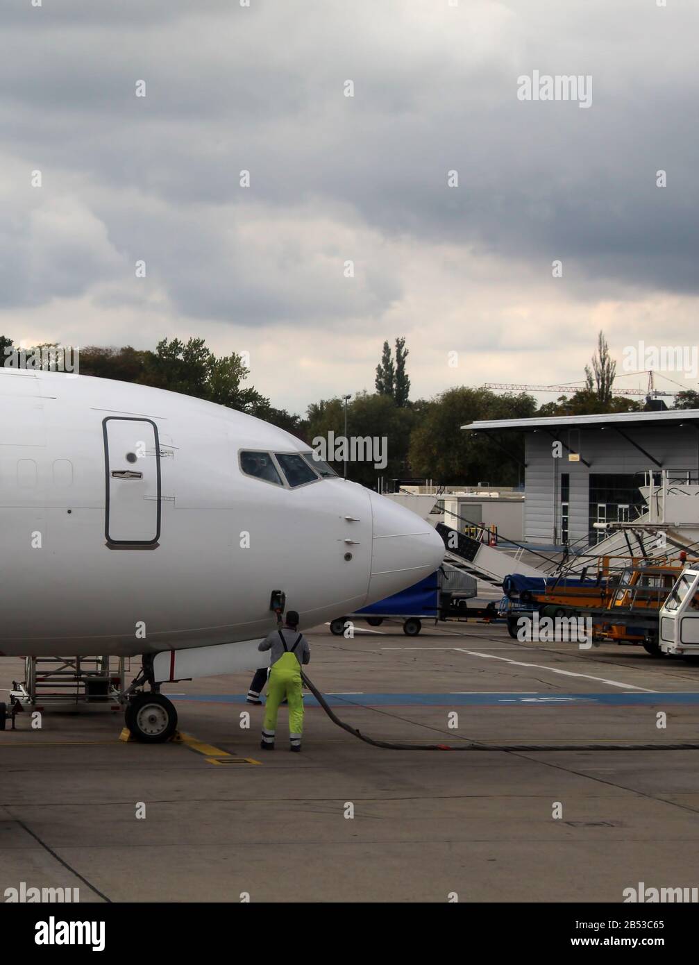 Preparation of the airplane before flight Stock Photo - Alamy