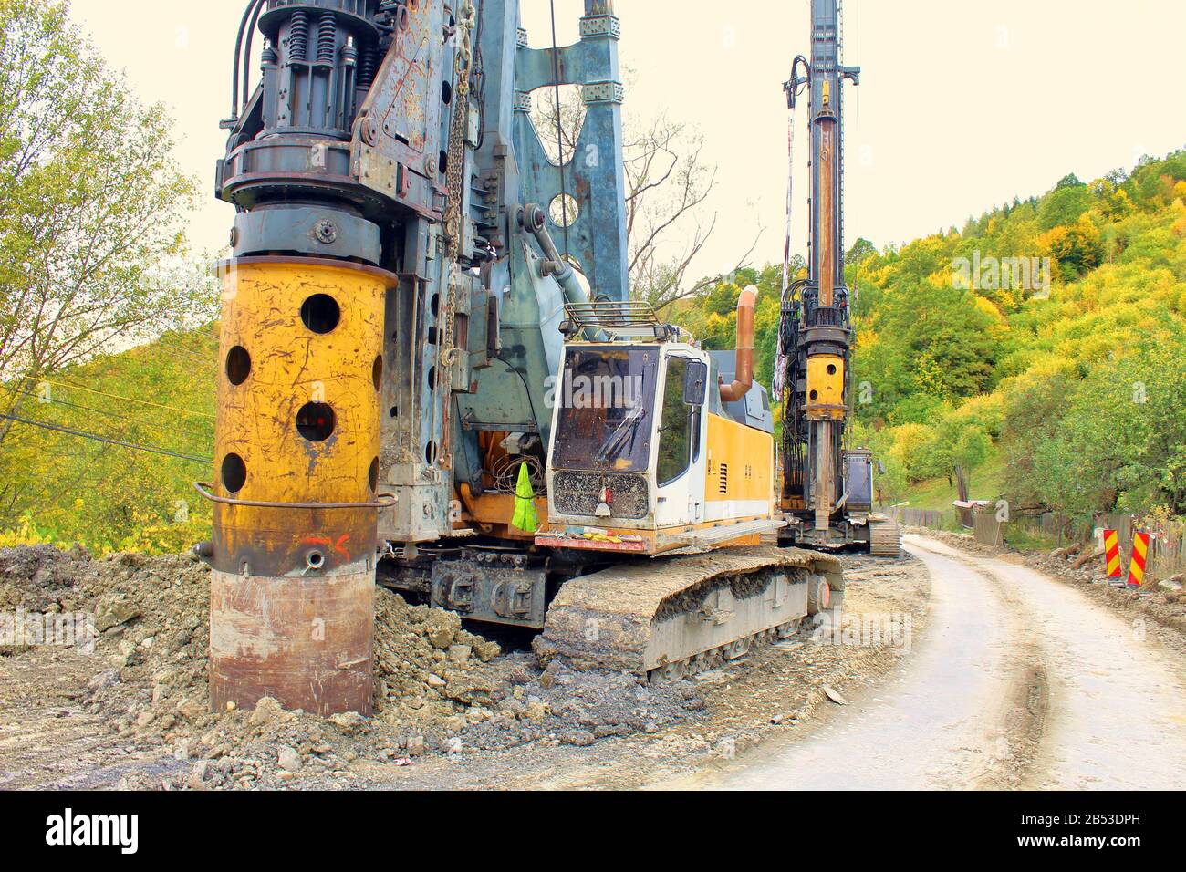 Machinery drilling on construction site Stock Photo - Alamy