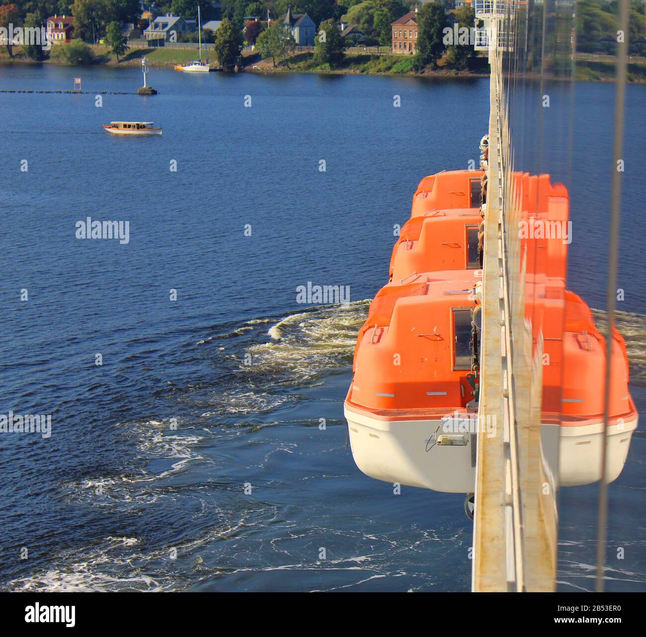 Orange lifeboats on the deck of ferry Stock Photo - Alamy