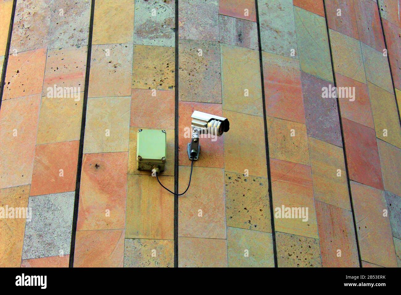 Security surveillance camera on wall Stock Photo - Alamy
