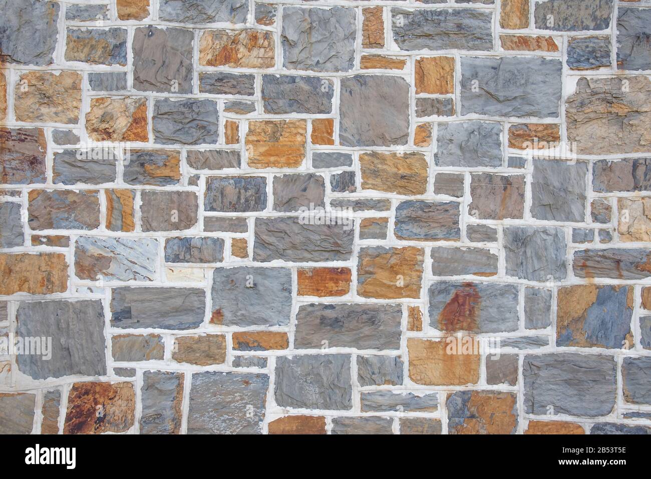 Gold brick wall hi-res stock photography and images - Alamy