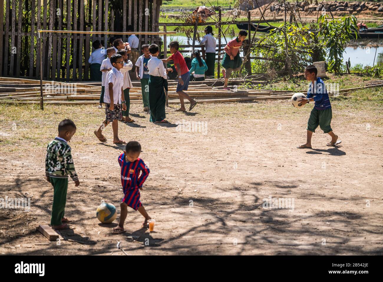 Local boys playing football, Inlee lake, Myanmar, Asia Stock Photo - Alamy